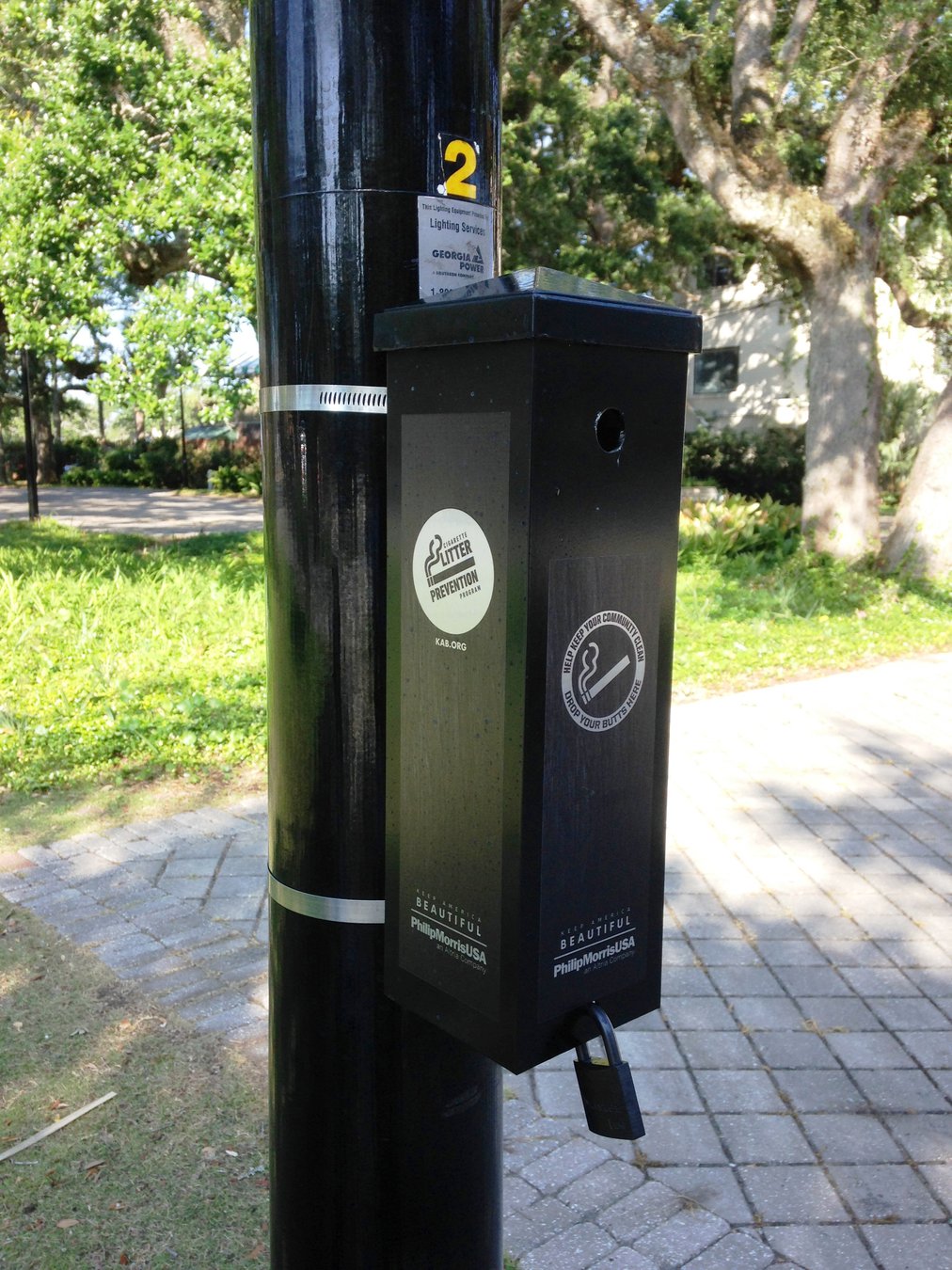 Cigarette receptacles being placed in Liberty County - Coastal Courier