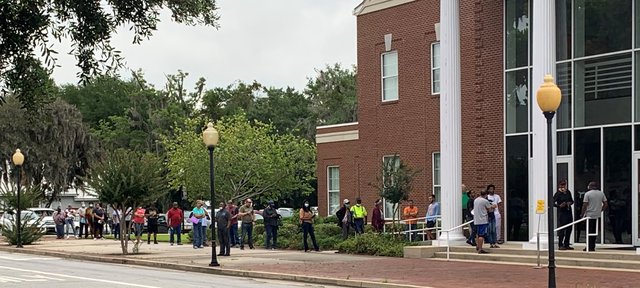 Long lines at County tag office - Coastal Courier