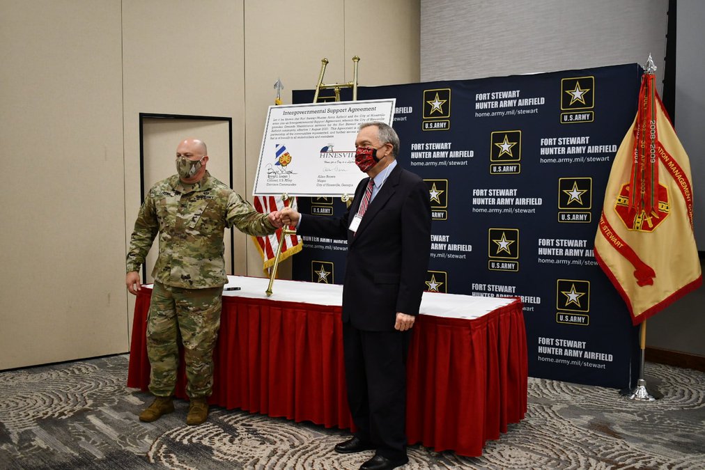 Fort Stewart, City sign agreement - Coastal Courier
