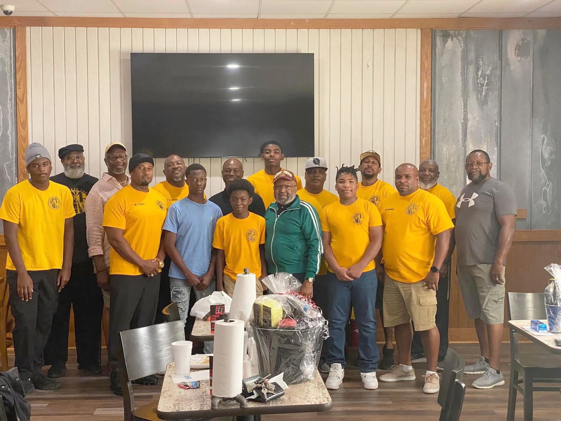 11 Black Men help out in the community - Coastal Courier