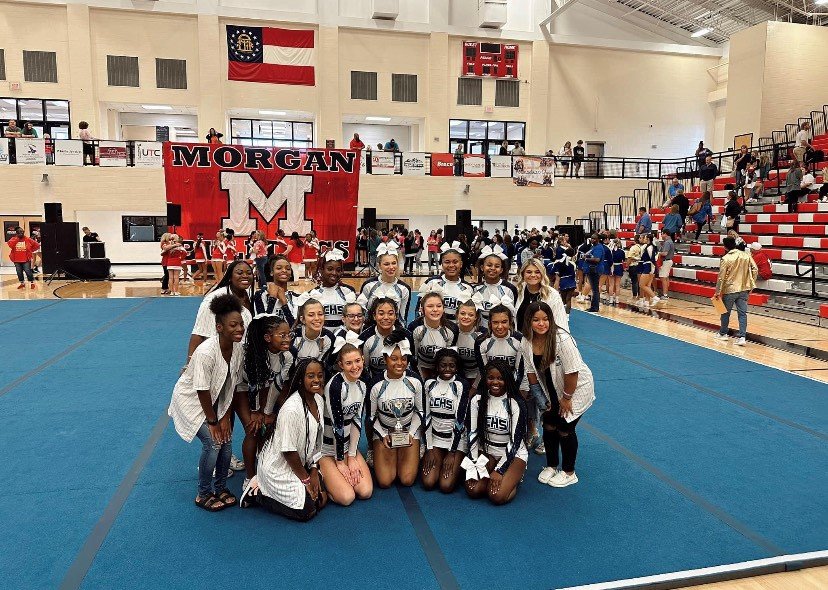 Tide cheer place second at region, advance to state - Coastal Courier